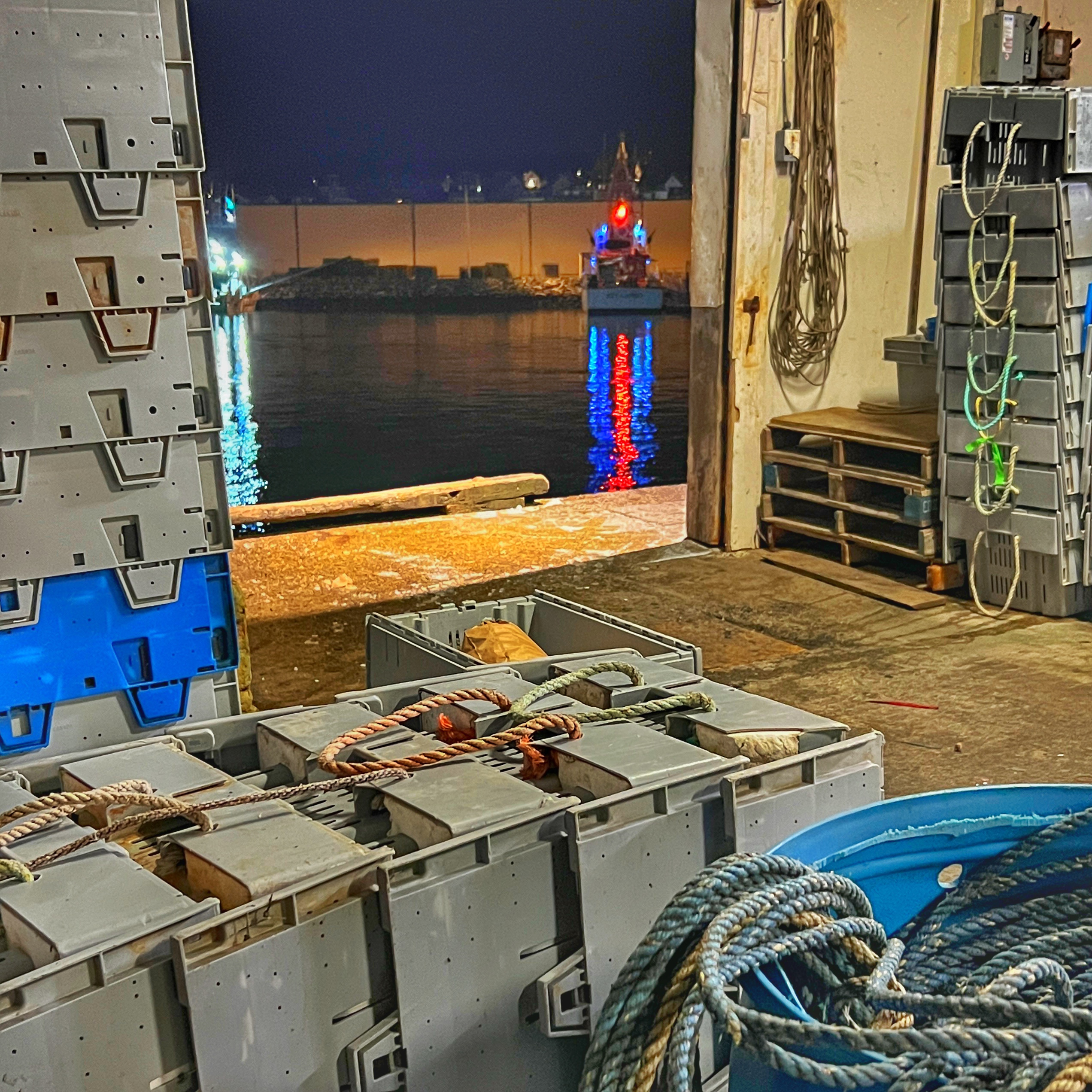 Early Morning Coast Guard Light Reflections At Captain Joe and Sons ...