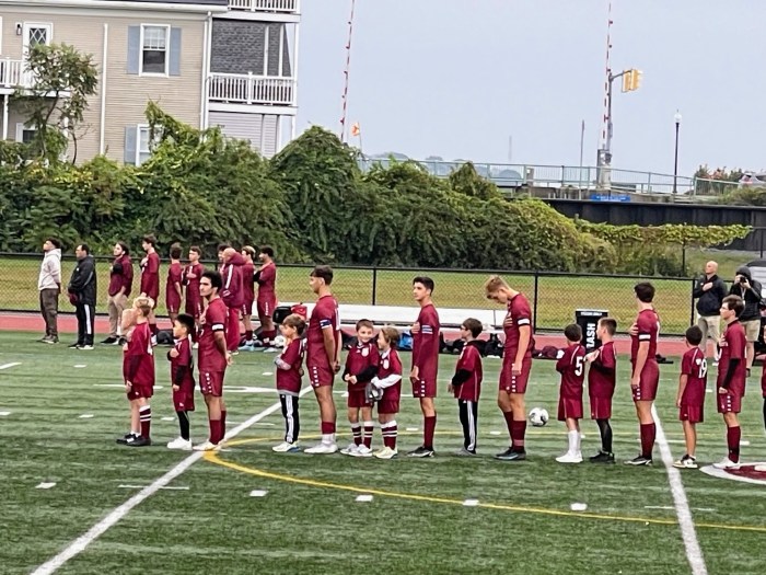 Youth Soccer players walk on New Balance Field at Newell Stadium with ...