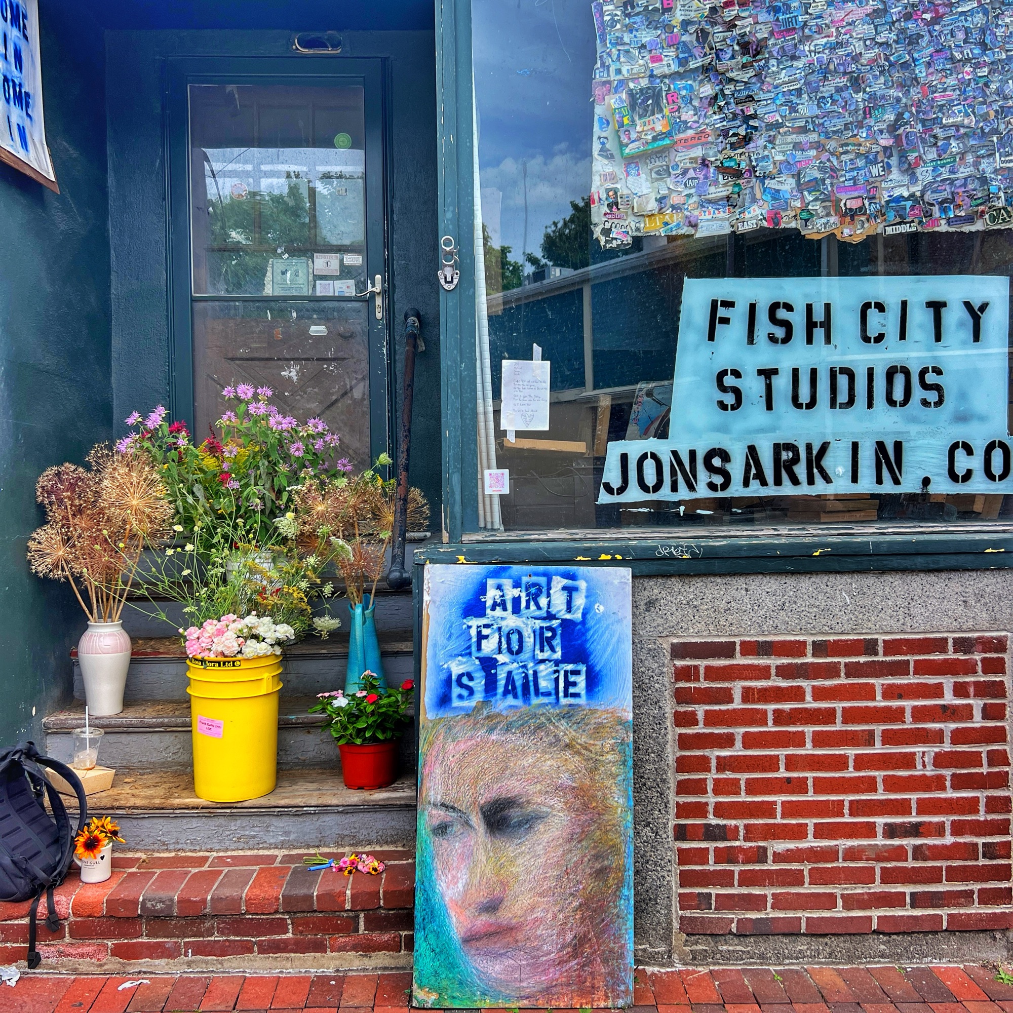 Tributes left for Jon Sarkin on the stoop of his Fish City Studios ...