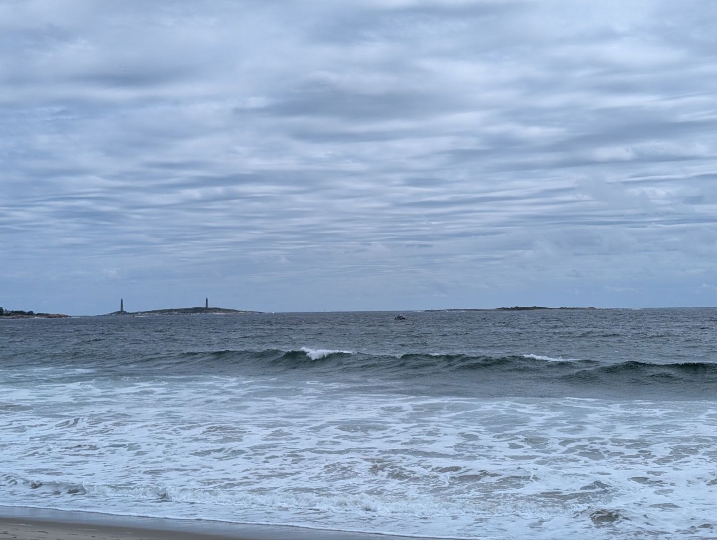 Police boats and patrols investigate lifeguards’ and beach goers’ shark sighting off Long Beach ...