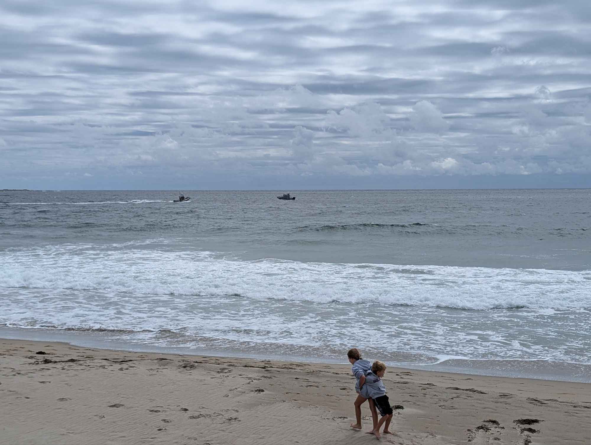 Police boats and patrols investigate lifeguards’ and beach goers’ shark sighting off Long Beach ...