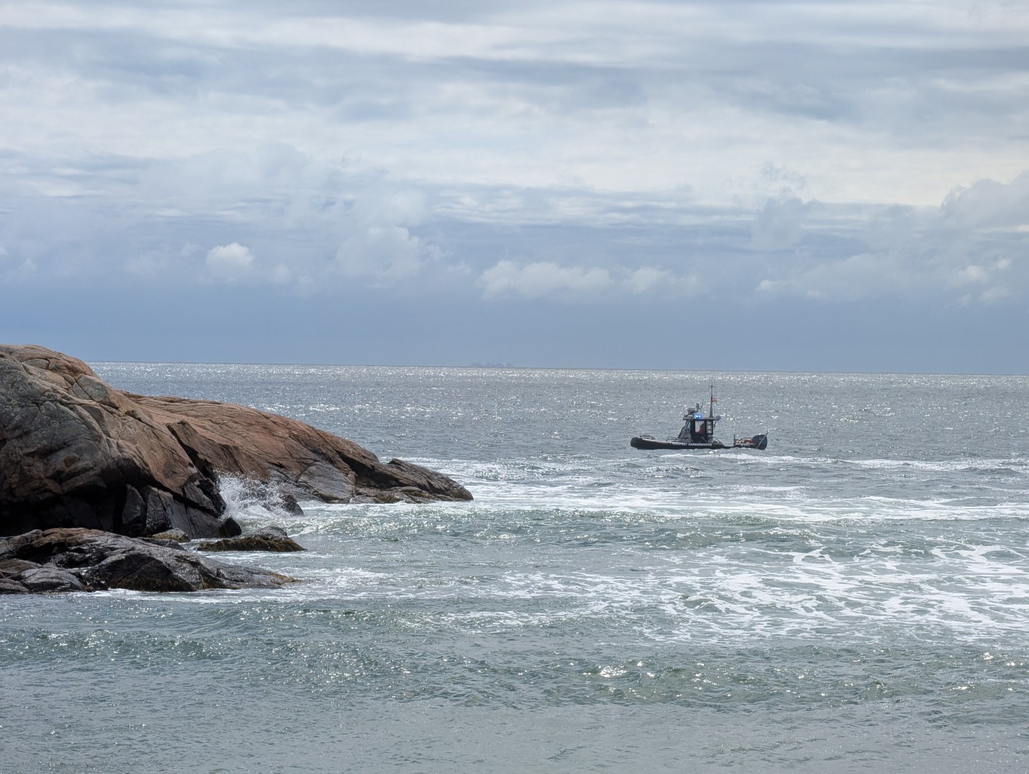 Police boats and patrols investigate lifeguards’ and beach goers’ shark sighting off Long Beach ...